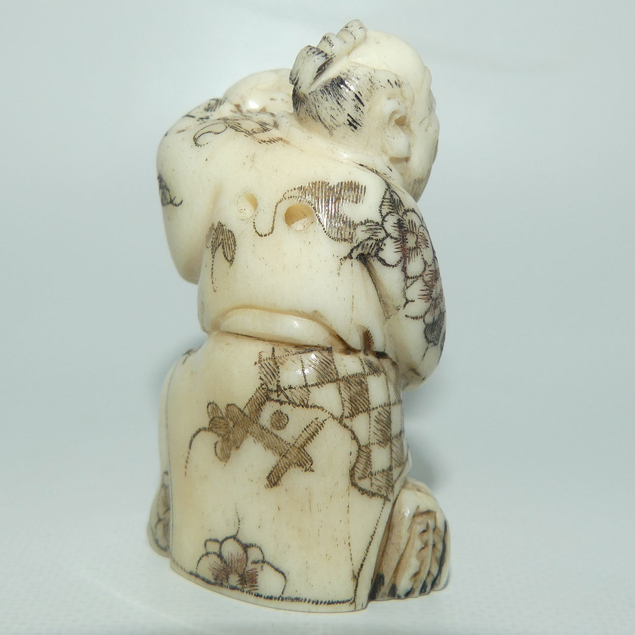 Japanese Carved Bone Netsuke | Old Man holding Lantern – Roundabout ...