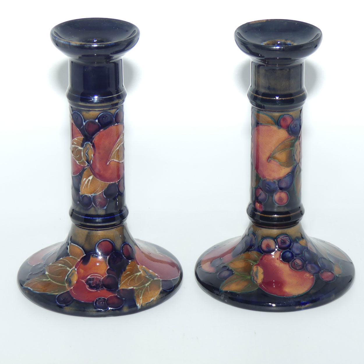 William Moorcroft Pottery Pomegranate candlesticks – Roundabout Antiques